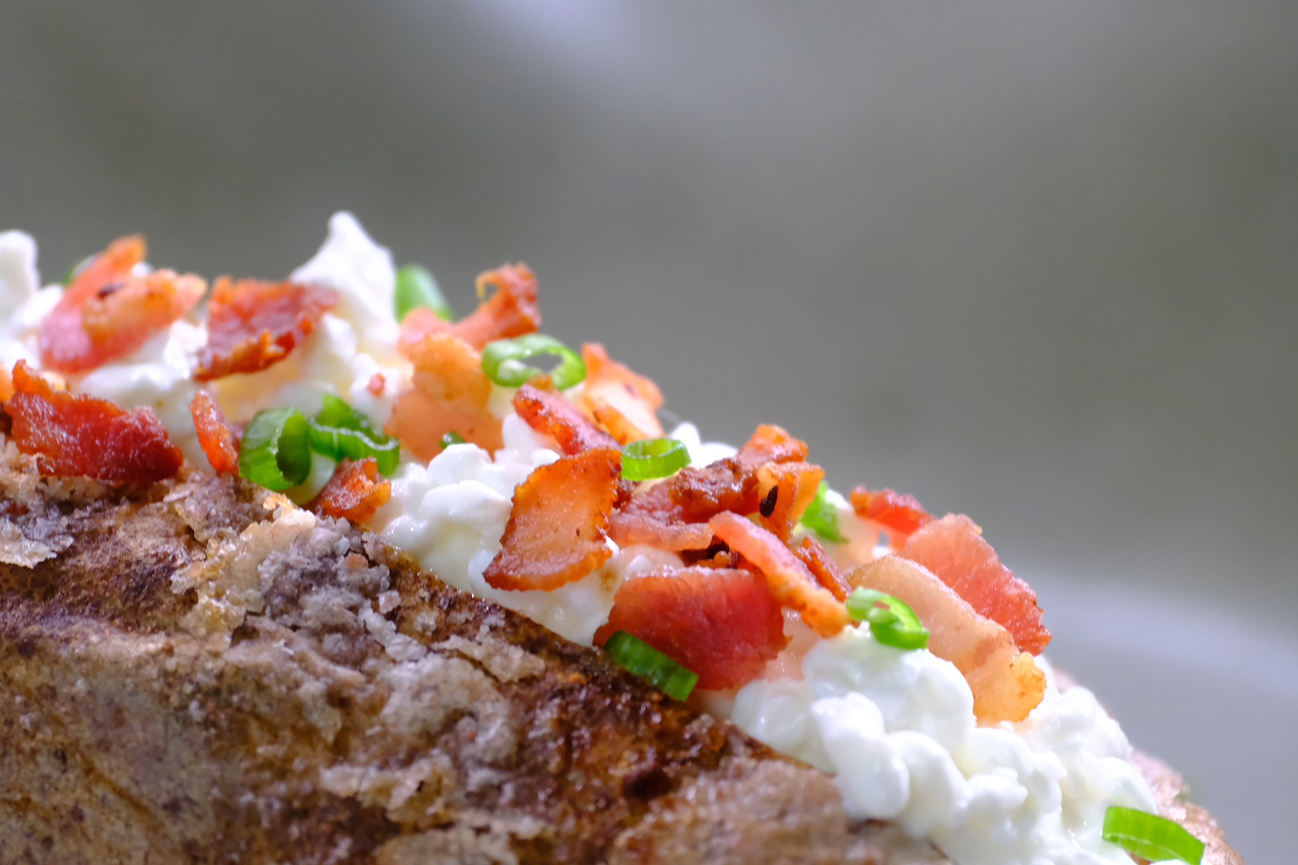 cottage cheese & crispy bacon baked potato - Glenisk